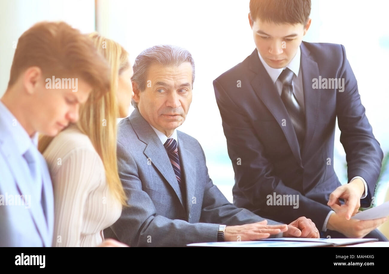 Business team working on their business project together Stock Photo ...
