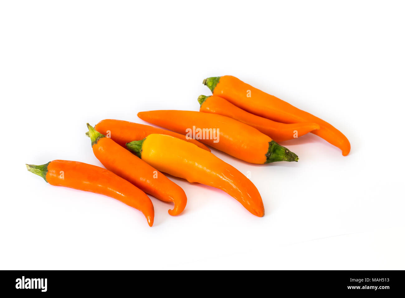 orange hot chilies isolated on white background Stock Photo - Alamy