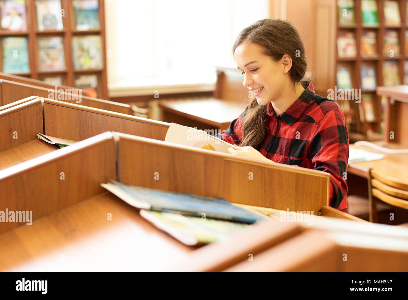 Modern workstation in library Stock Photo - Alamy
