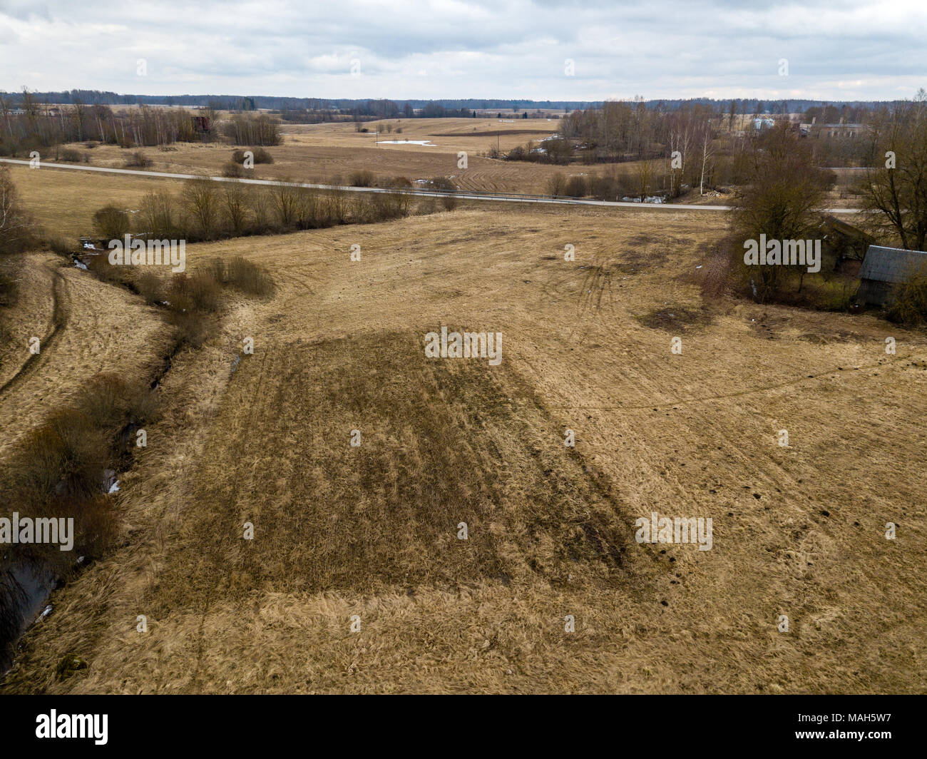 drone image. aerial view of rural area with houses and road network ...