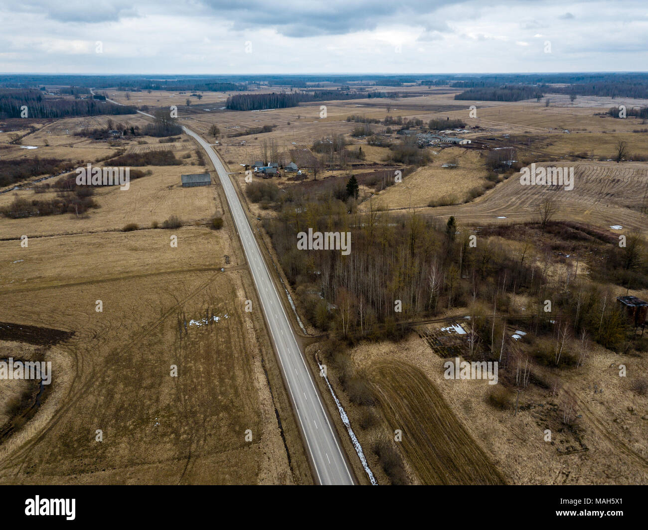 drone image. aerial view of rural area with houses and road network ...