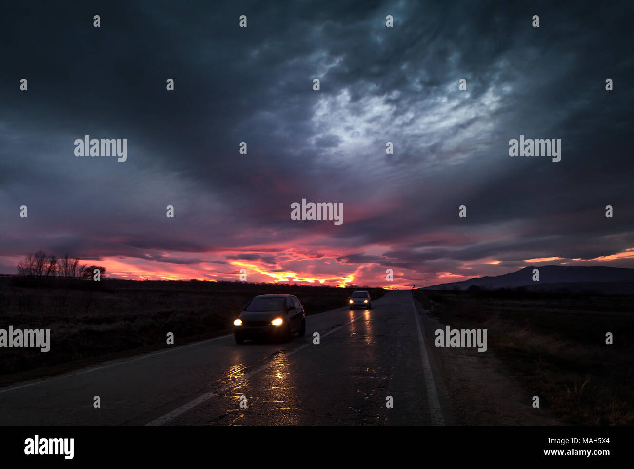 Moody dramatic scene cars passing hi-res stock photography and images ...