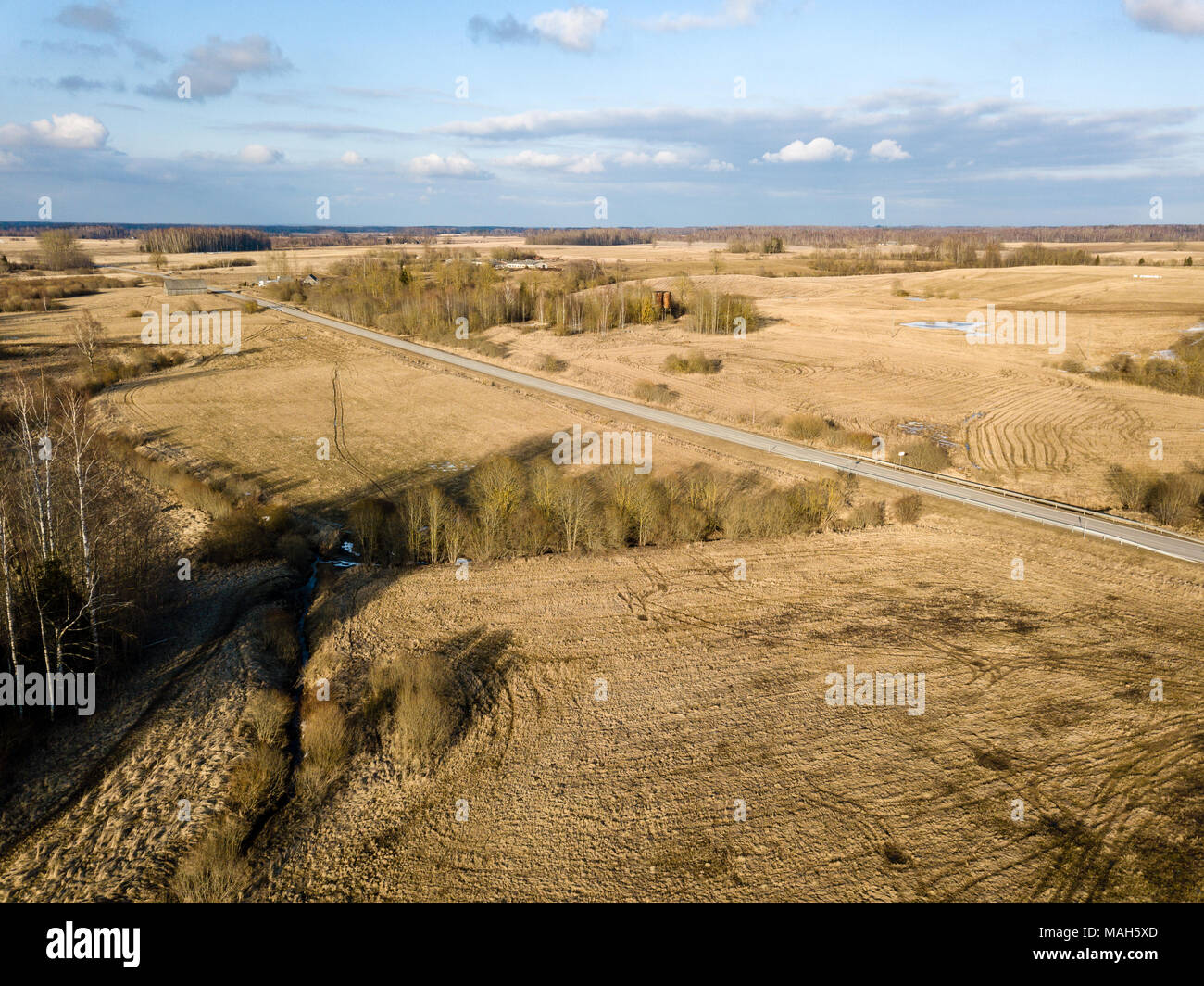 drone image. aerial view of rural area with houses and road network ...
