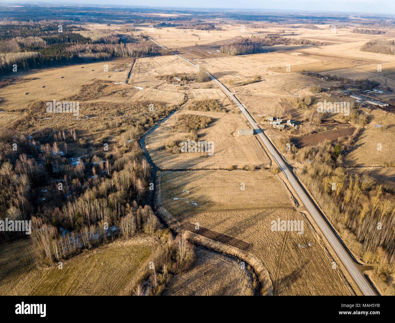 drone image. aerial view of rural area with houses and road network ...