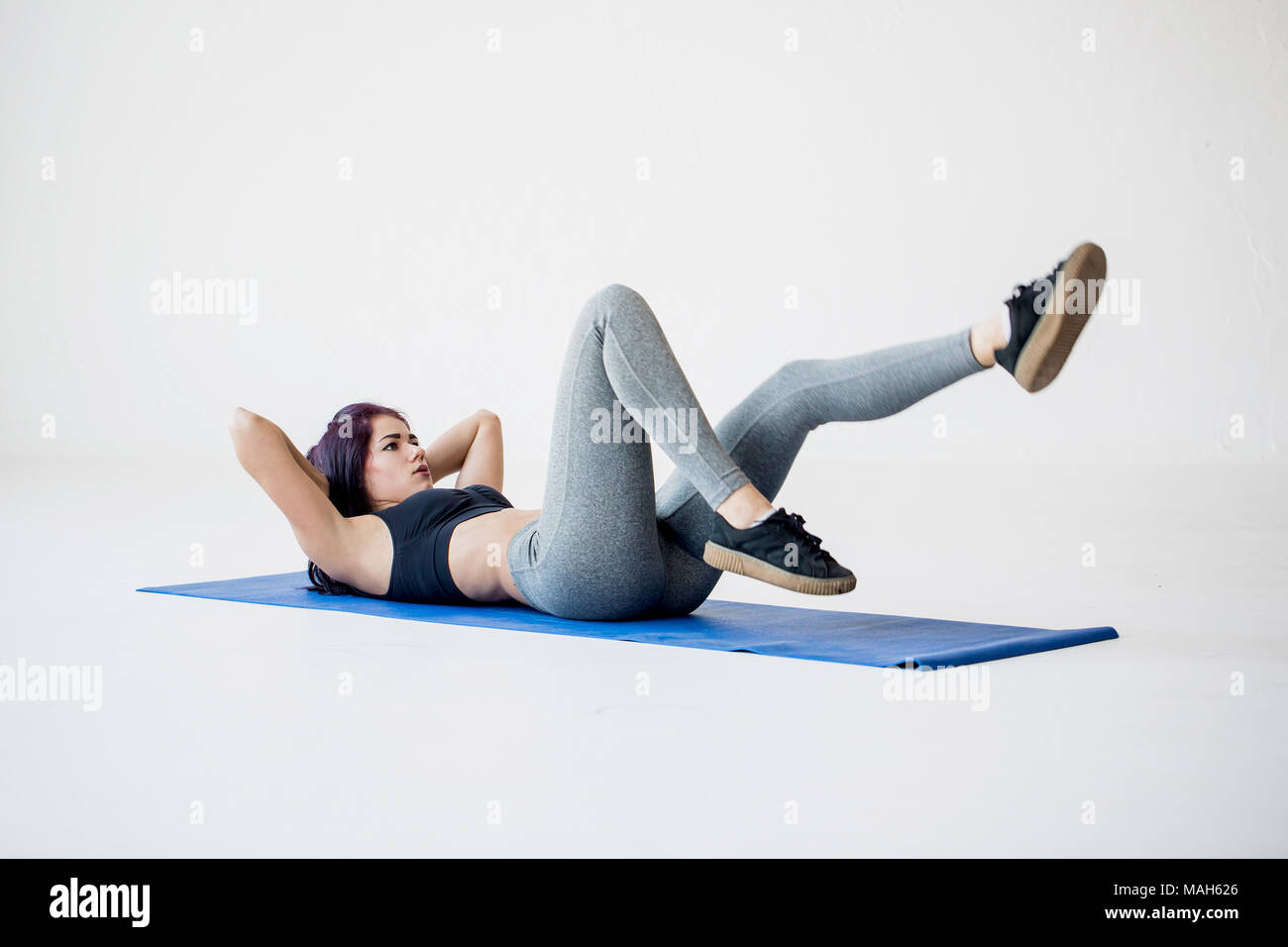 Sport tutorials for beginners to warm up. The attractive athletic ...