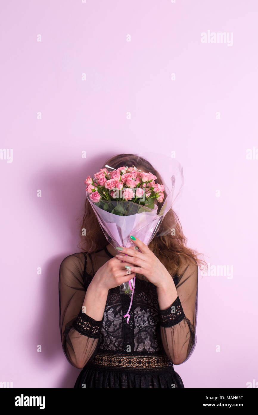 The girl covered her face Stock Photo - Alamy