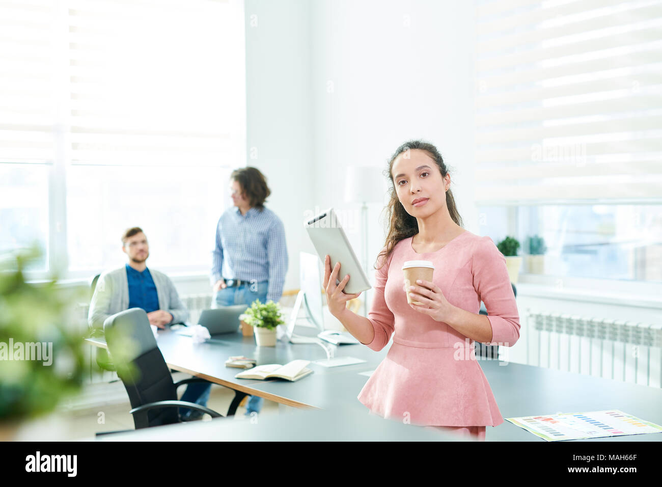 Serious hispanic business woman hi-res stock photography and images - Alamy