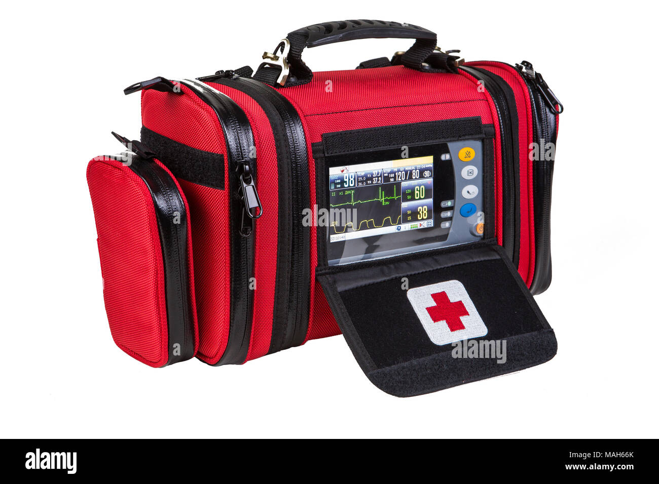 Modern portable biphasic defibrillator in red bag isolated on white ...
