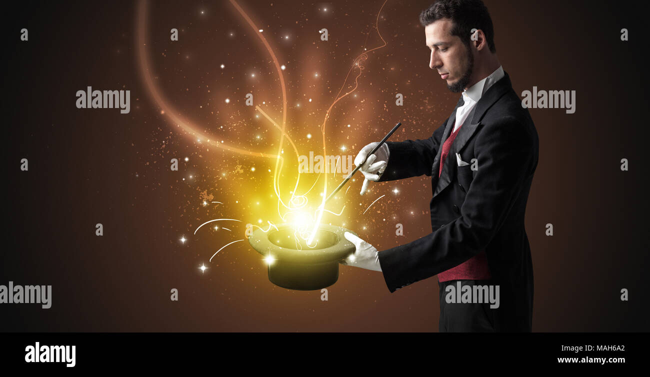 Hand Holding Magic Wand High Resolution Stock Photography and Images ...