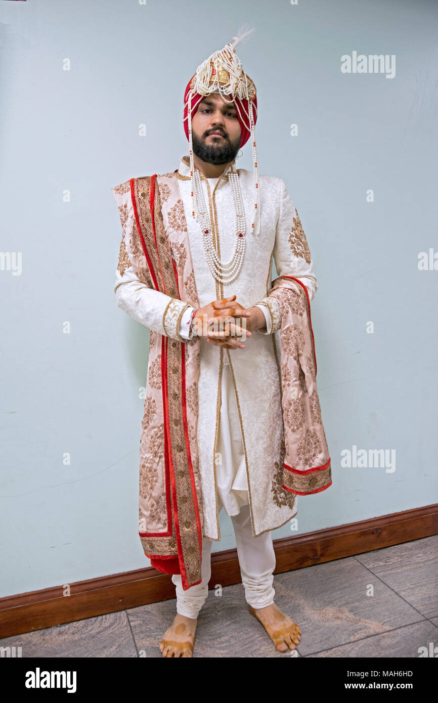 A Sikh groom visits a temple on his wedding at the Gurdwara Sikh ...