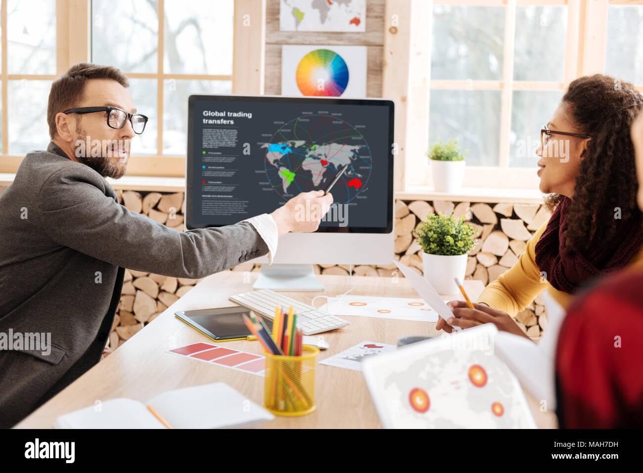 Group experienced employees workplace hi-res stock photography and ...