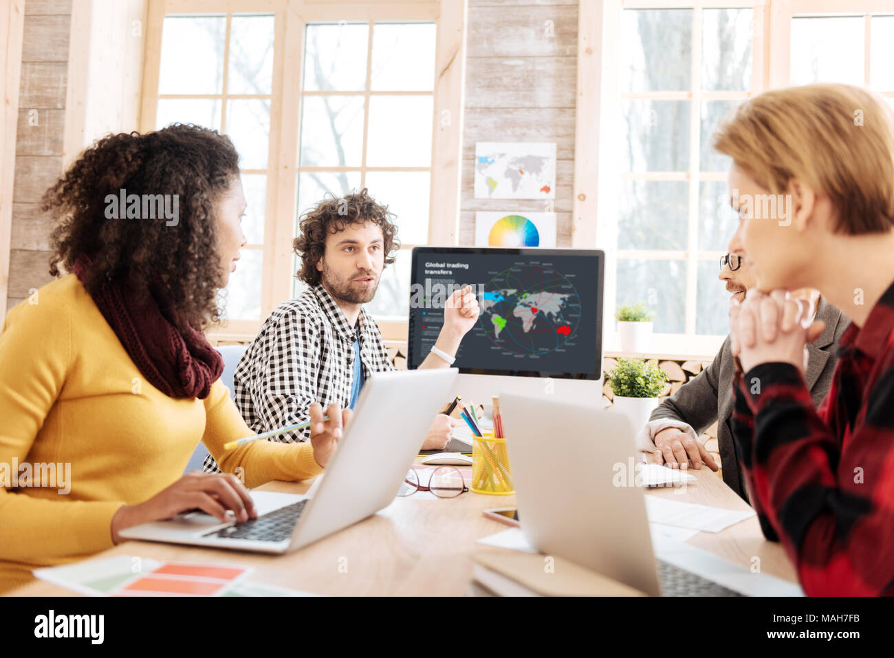 Group experienced employees workplace hi-res stock photography and ...