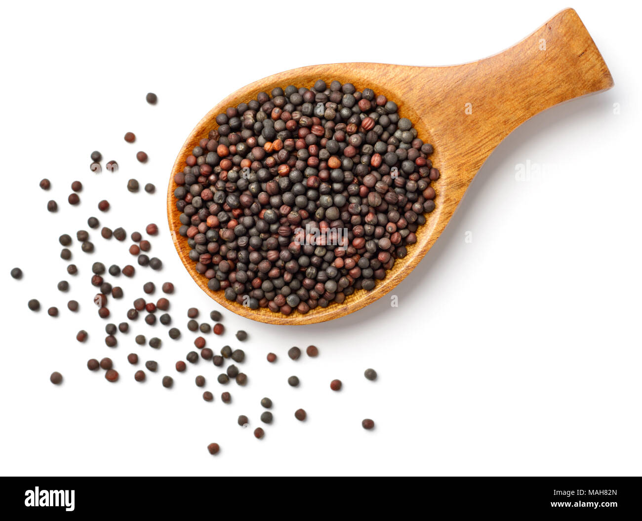 dried canola seeds isolated on white background Stock Photo - Alamy