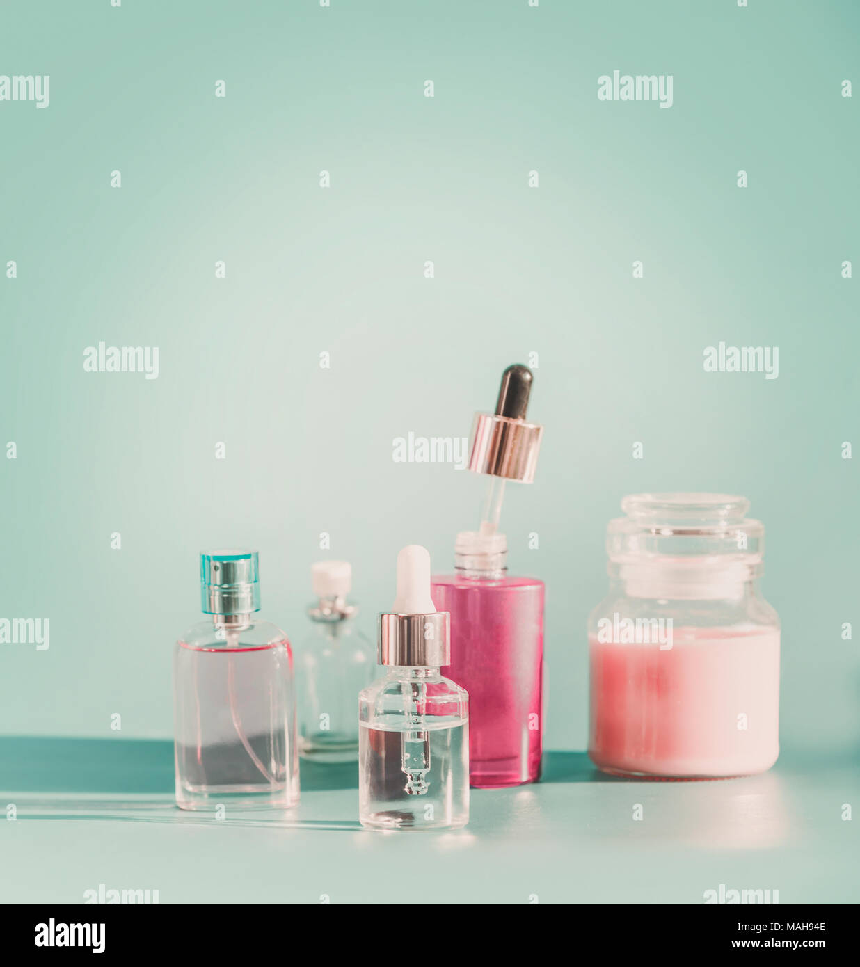 Set of modern facial skin care cosmetics at blue background Product ...