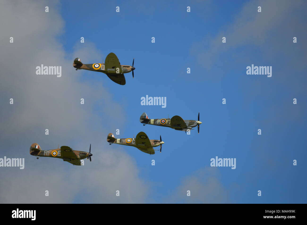 Four Supermarine Spitfire aircraft in formation Stock Photo - Alamy