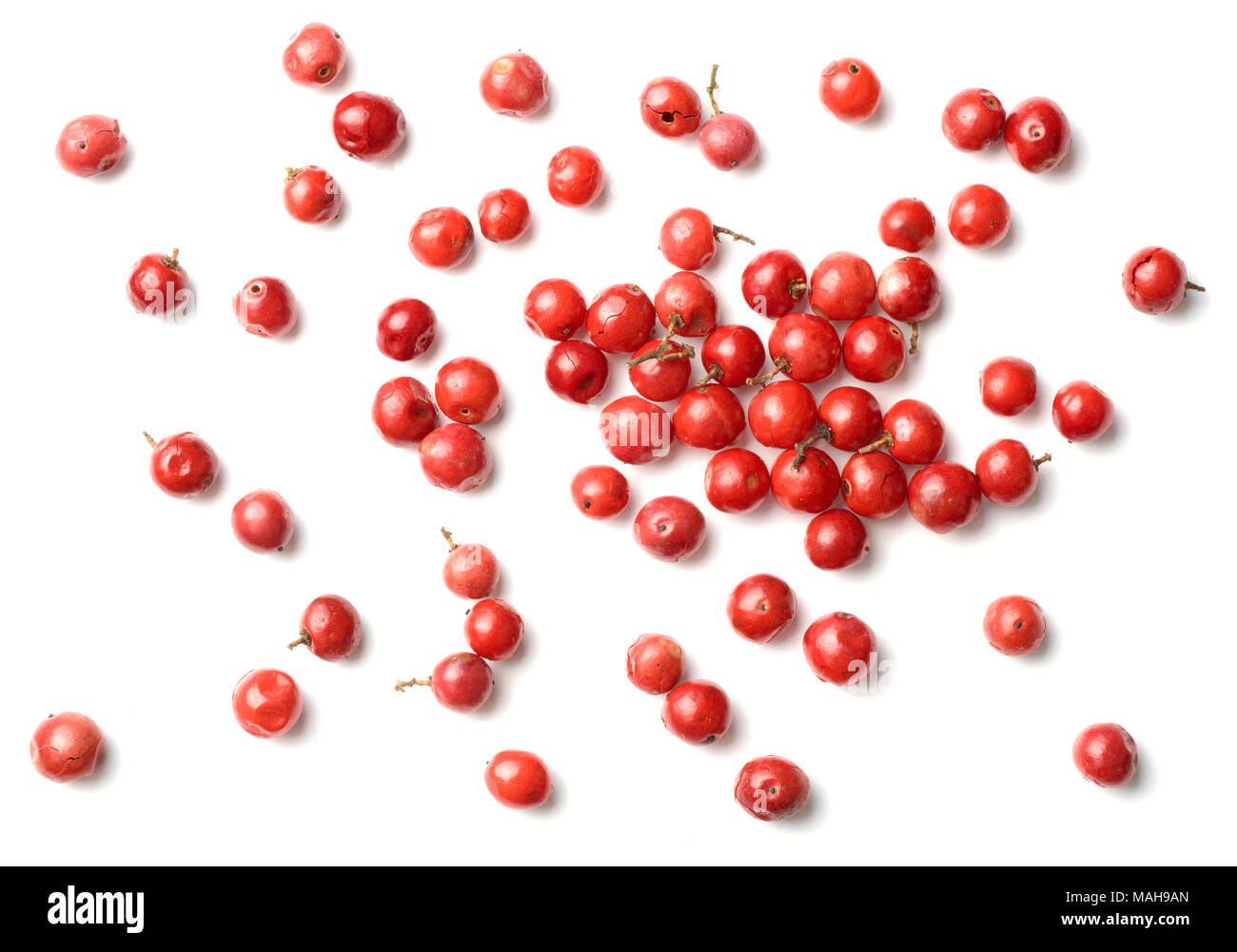 dried pink peppercorns isolated on white background Stock Photo - Alamy