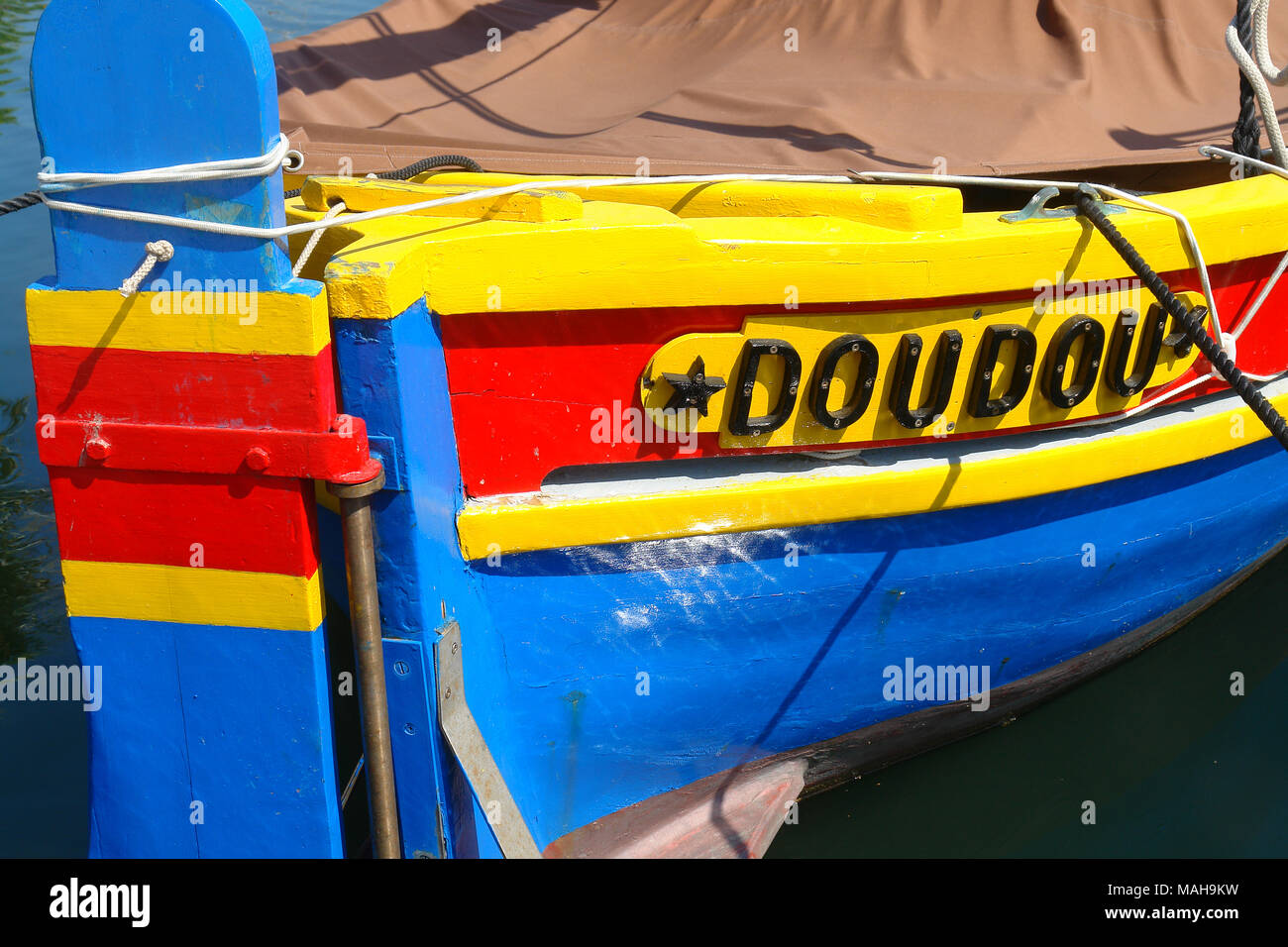 Small colorful fishing boat Stock Photo - Alamy