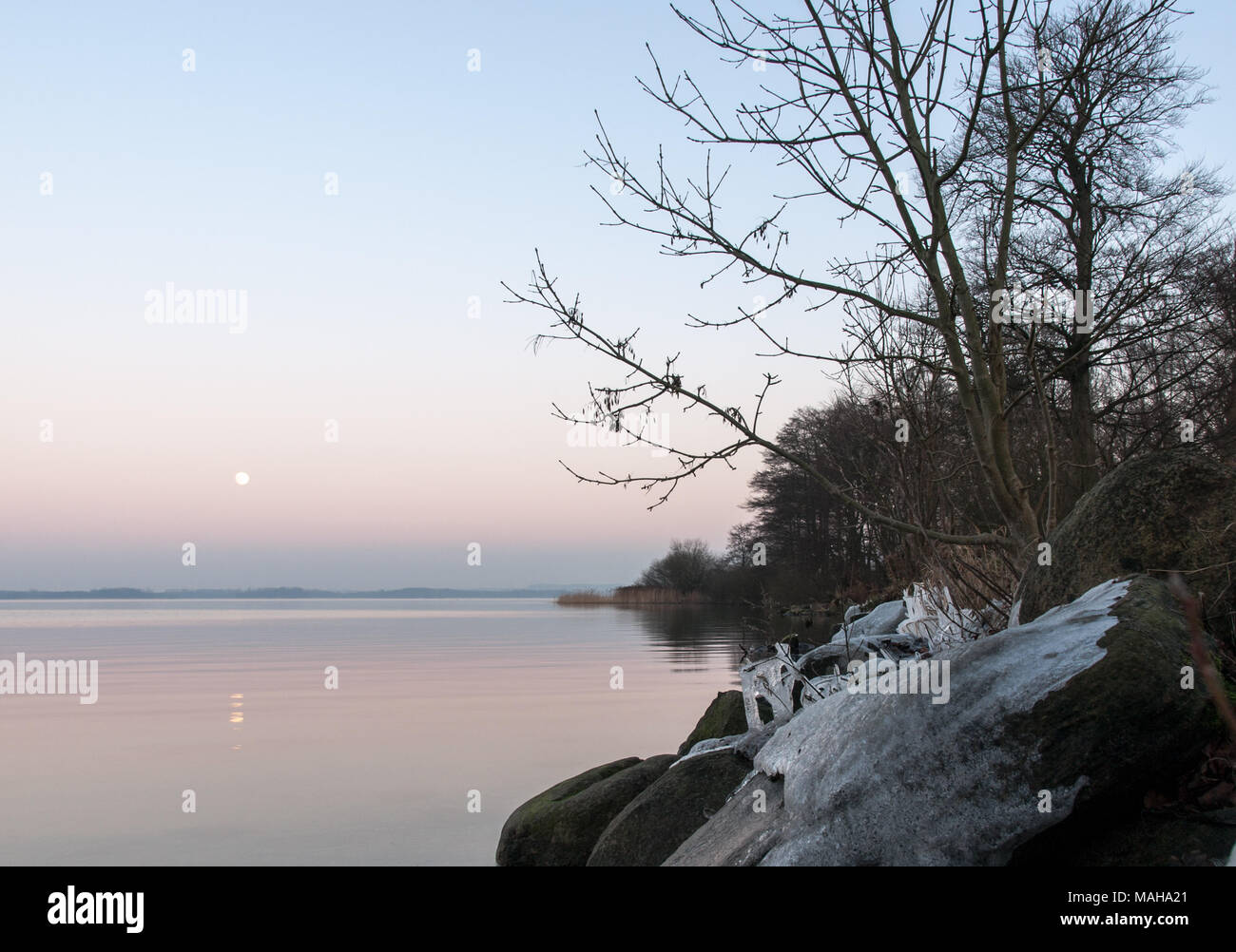 Panorama, footbridge, and quiet scene on the lake in the north, Germany ...