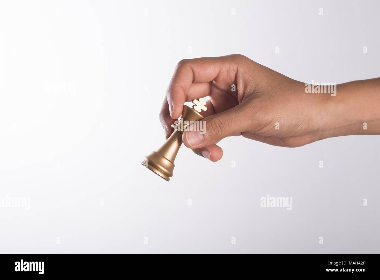 Woman hand holding chess king isolated on white Stock Photo - Alamy