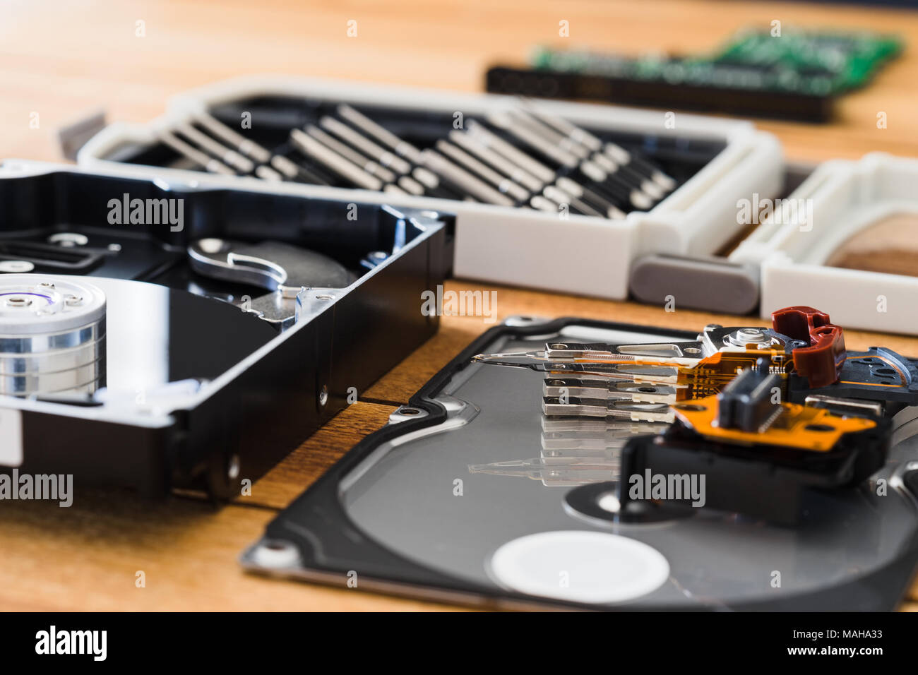 Hard disk drive inside close-up, spindle, actuator arm, read write head ...