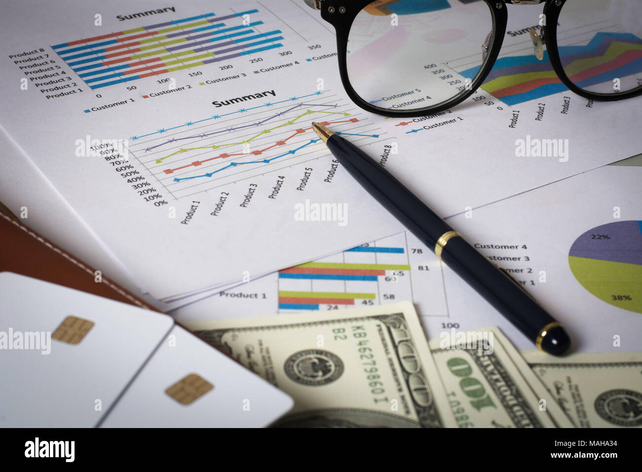 business workplace with paper chart,graph and money. Business finance ...