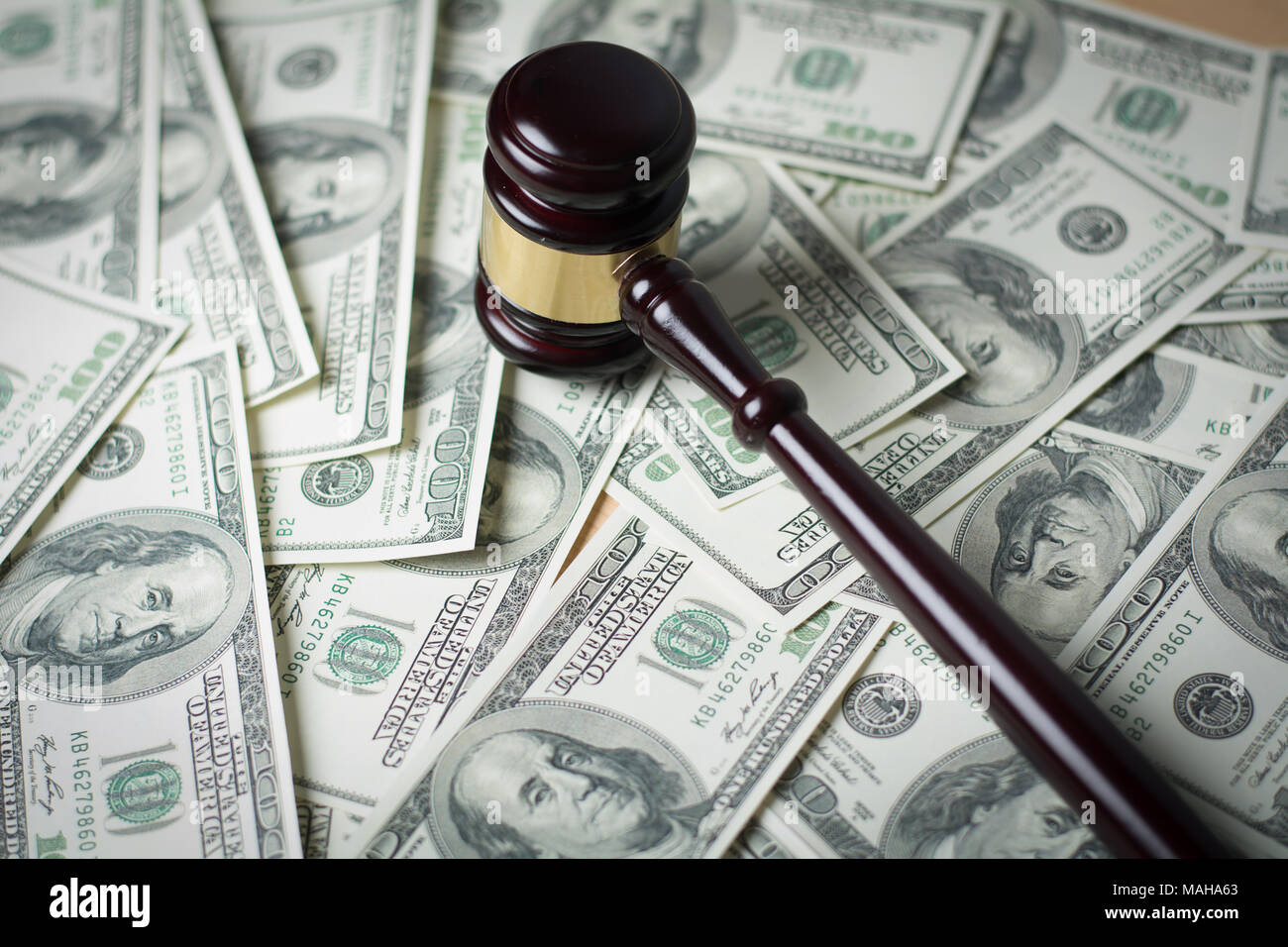 Concept of Legal court gavel on assorted cash, Close up Stock Photo - Alamy