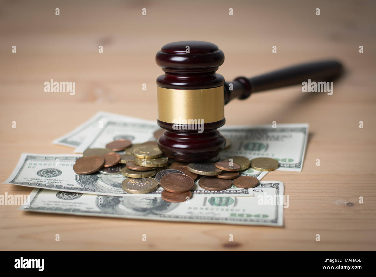 Concept of Legal court gavel on assorted cash, Close up Stock Photo - Alamy