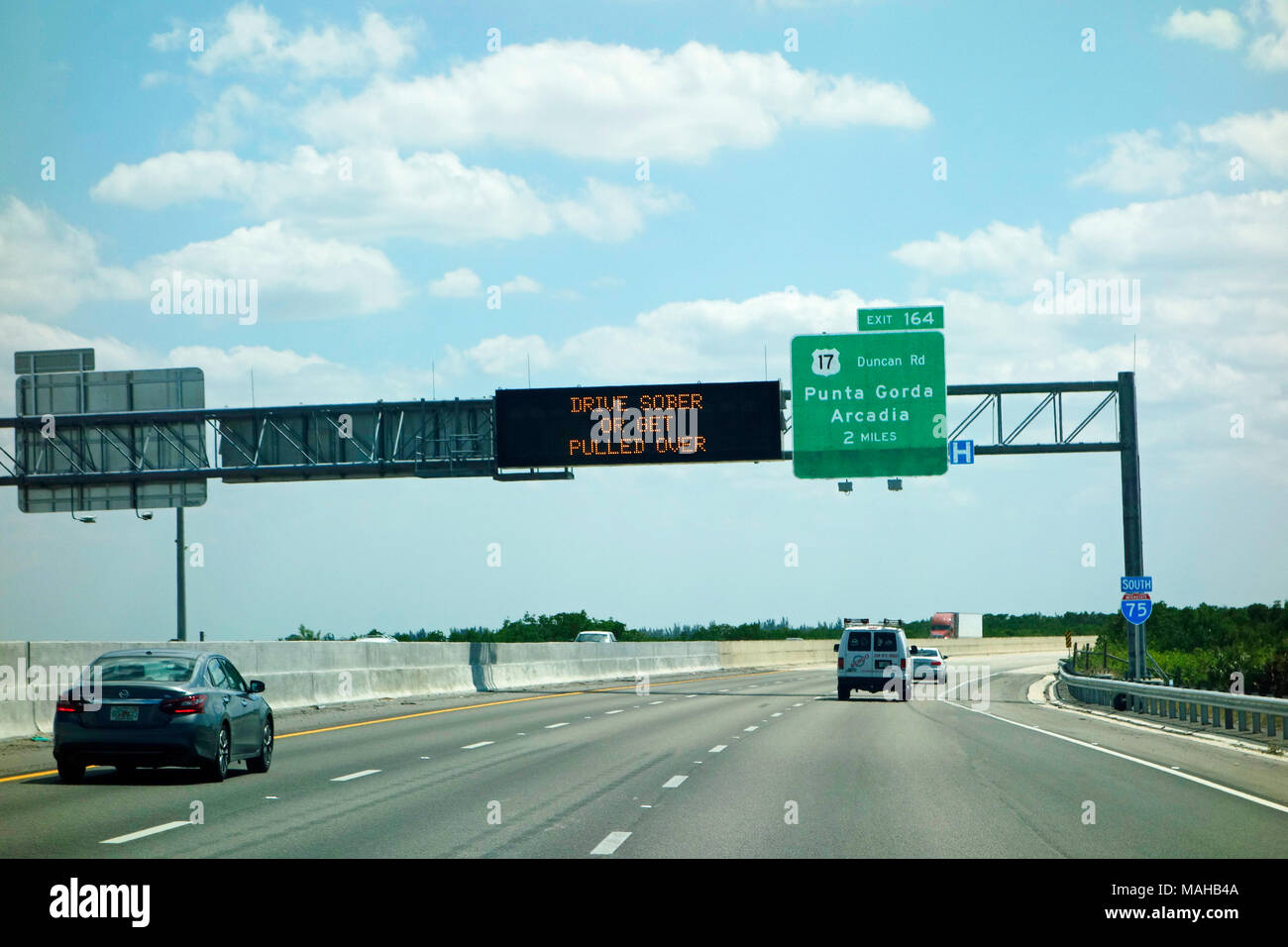 An interstate highway sign that says Drive Sober Or Get Pulled Over ...