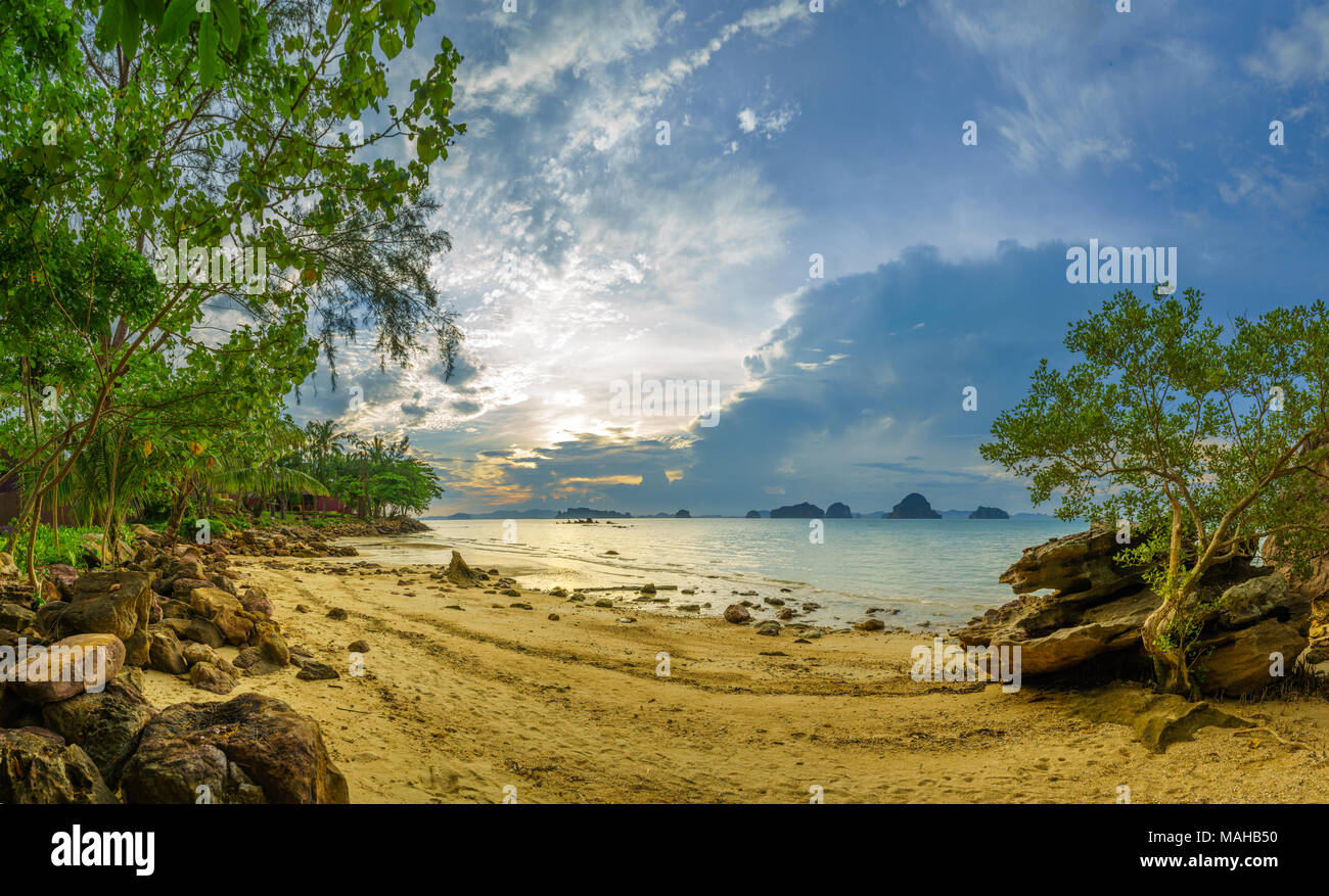 Beautiful Tropical beach at sunset at summer resort Stock Photo - Alamy