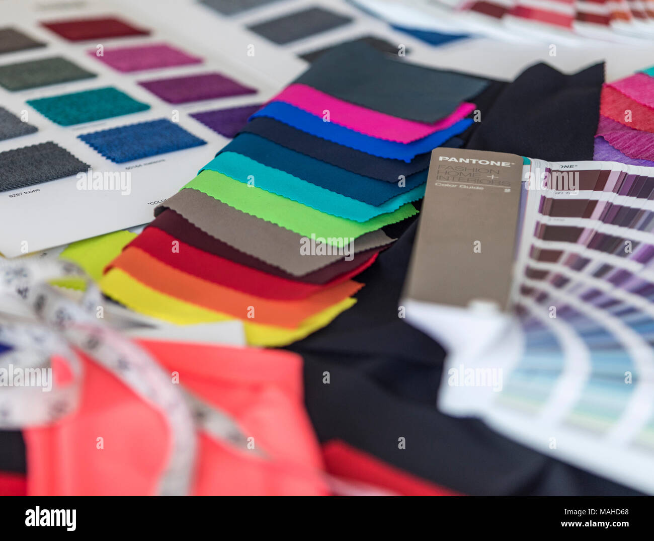 Pantone Books and Colourful Fabrics Stock Photo - Alamy