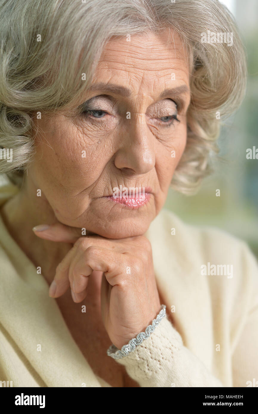 portrait of sad senior woman Stock Photo - Alamy