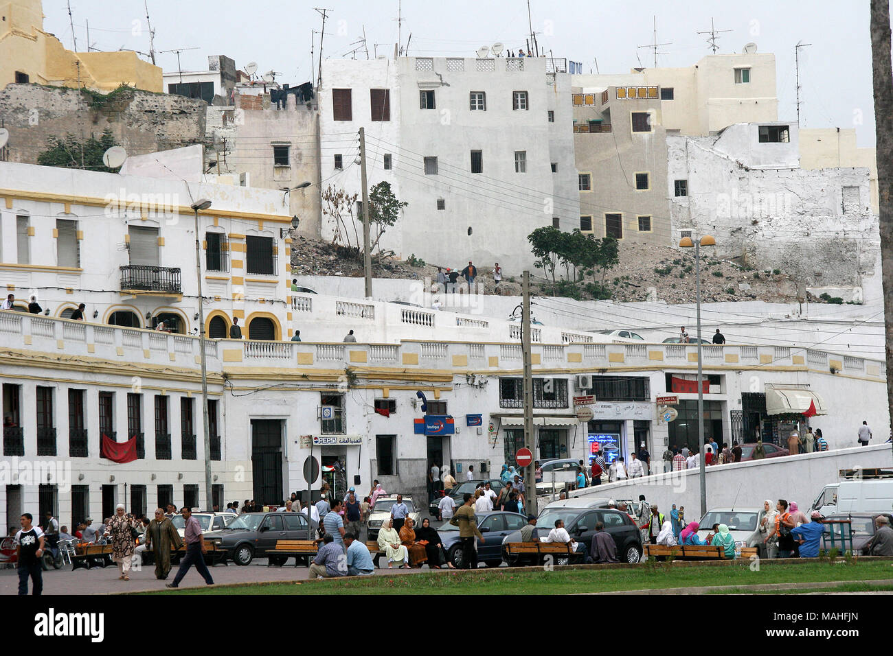 Crowds of people against empty buildings in Tangier Stock Photo - Alamy