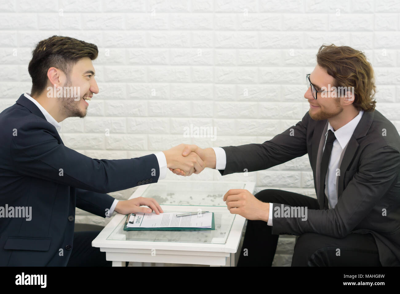 Business team discussing shake hands together for success deal Stock ...