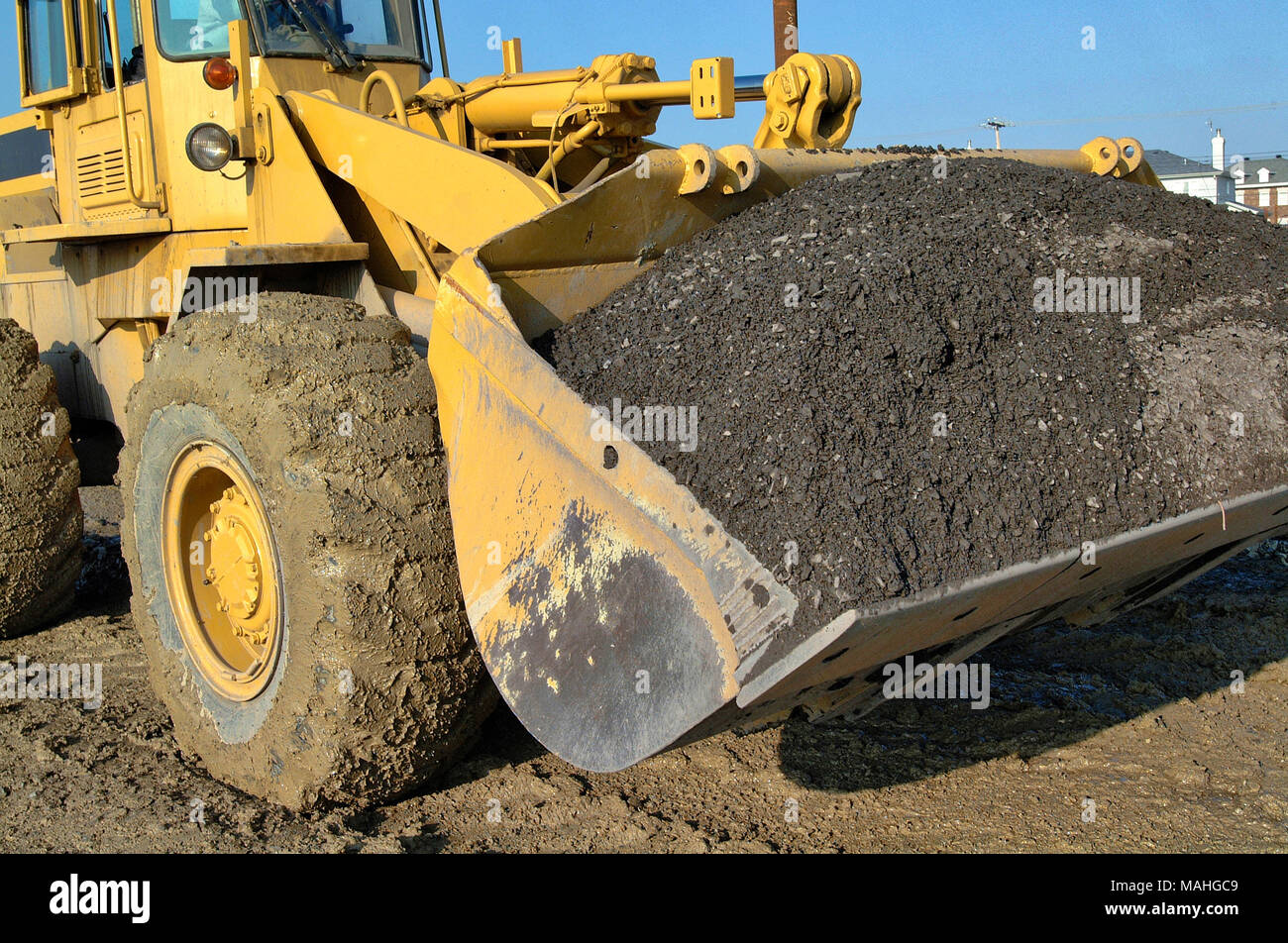 Heavy construction loader moving gravel at construction area Stock ...