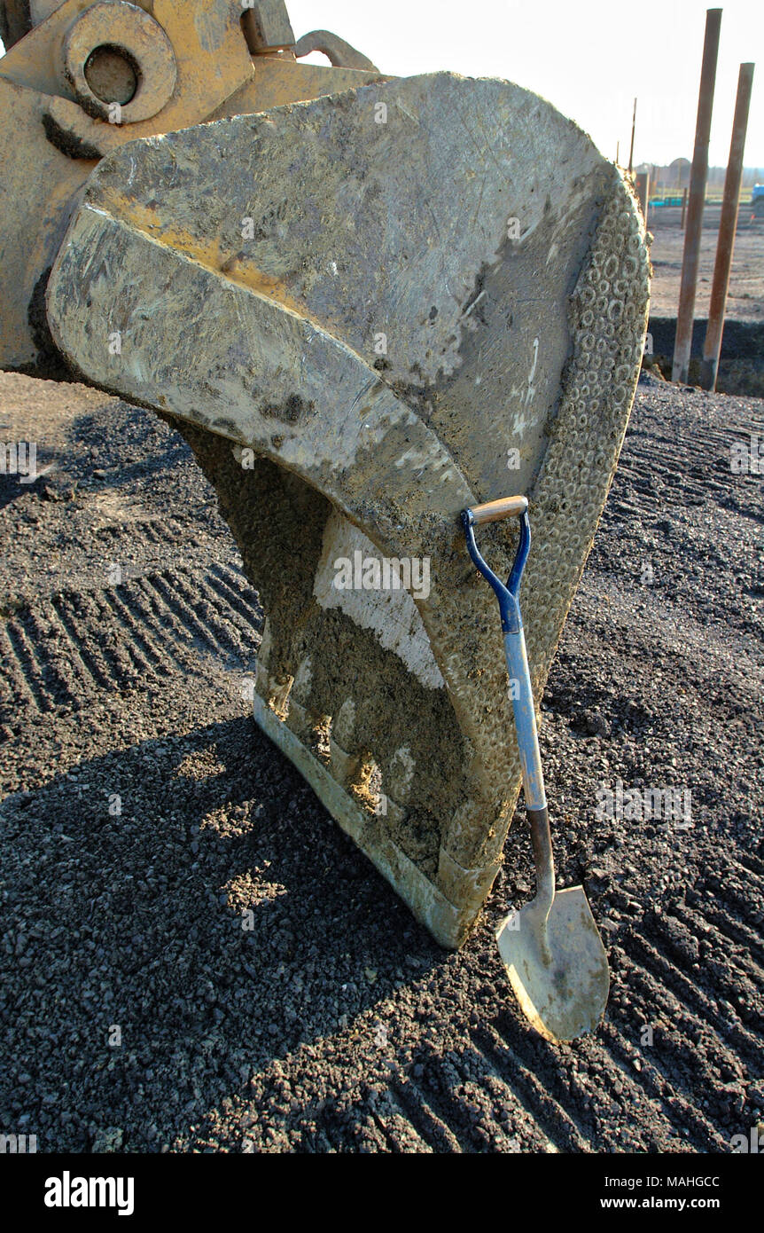 Mechanical shovel in close up on a construction site Stock Photo - Alamy