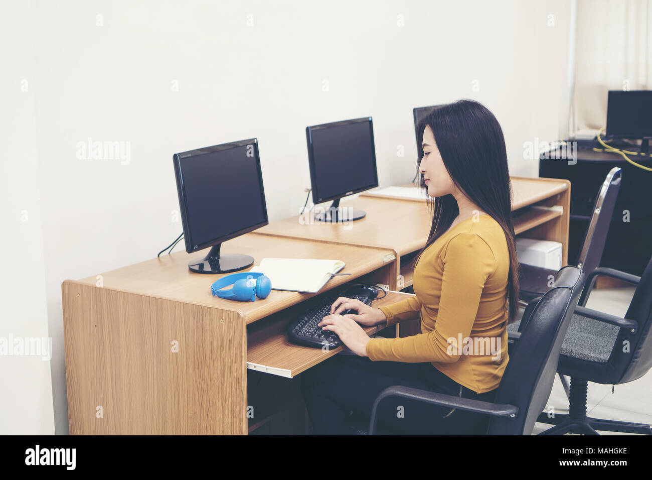 Beautiful woman using desktop hi-res stock photography and images - Alamy