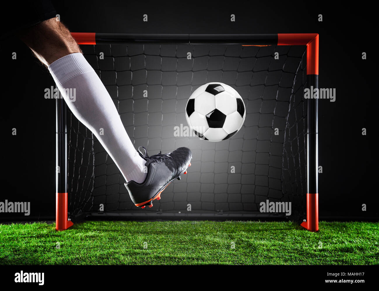 Soccer goal moment.Soccer World cup concept. Striker shooting on goal ...