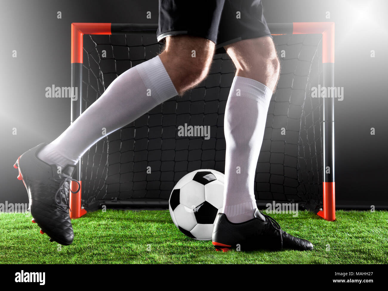 Soccer goal moment.Soccer World cup concept. Striker shooting on goal ...
