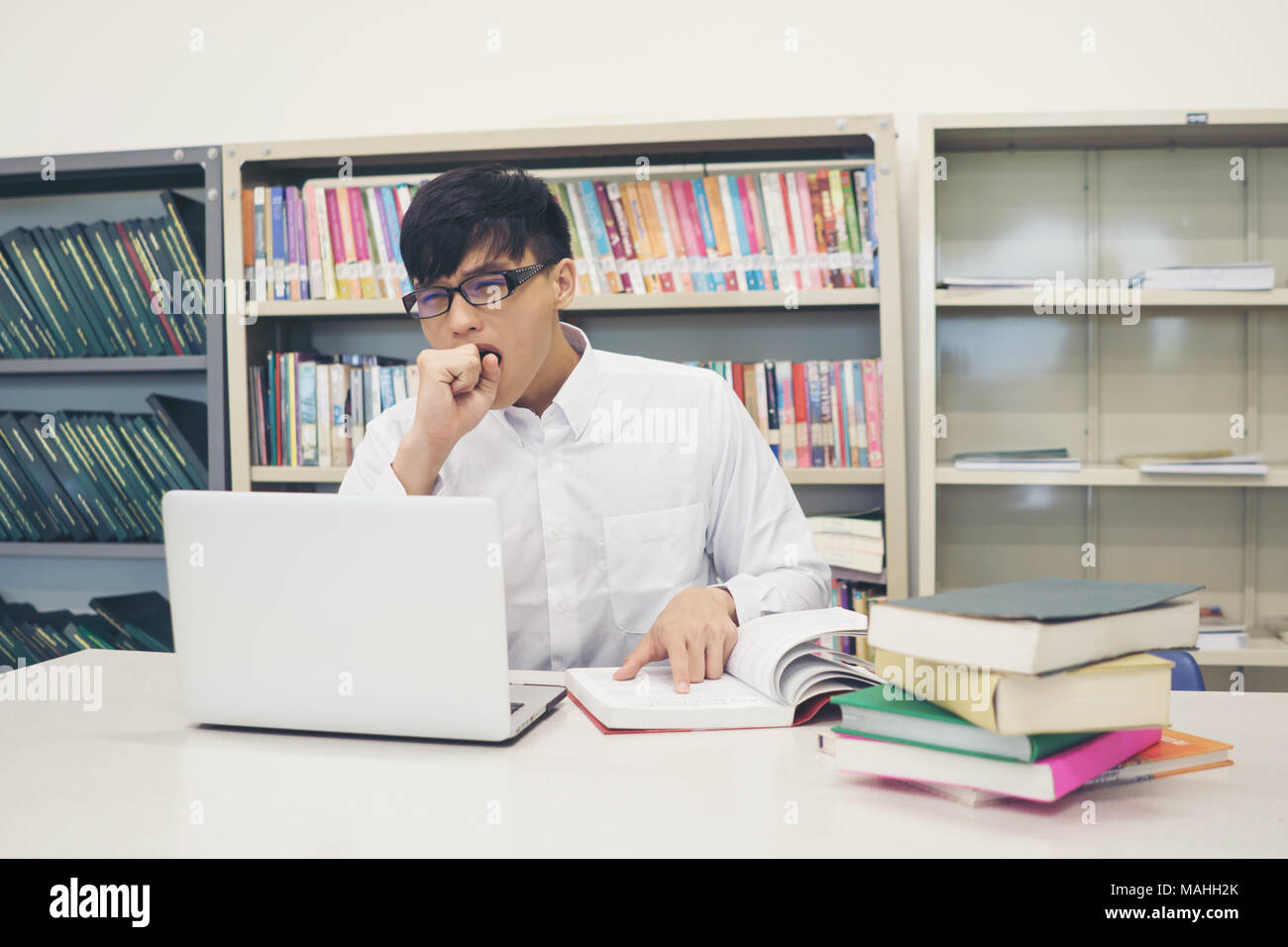 Student making research on laptop and browse internet. Education ...