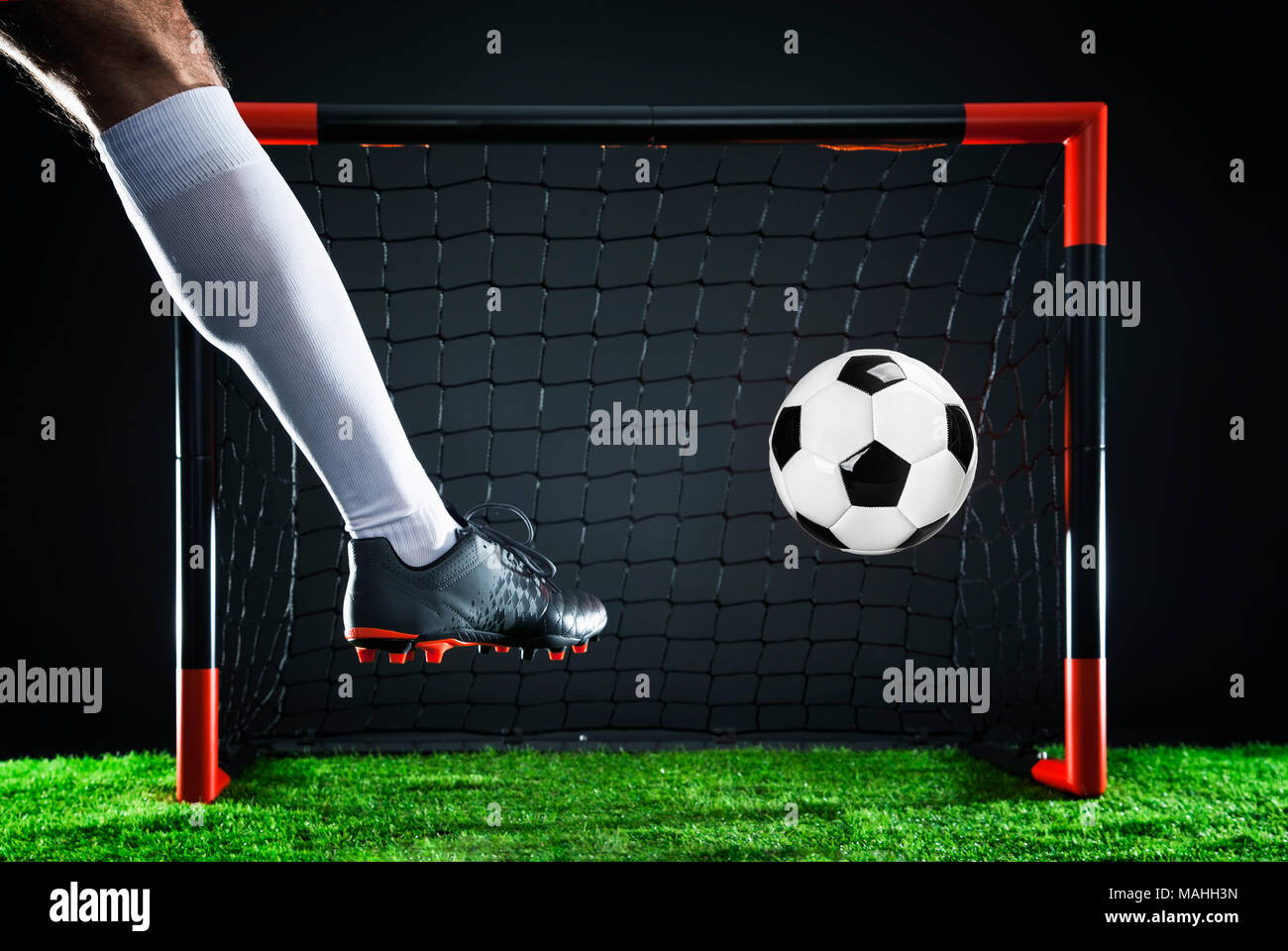 Soccer goal moment.Soccer World cup concept. Striker shooting on goal ...