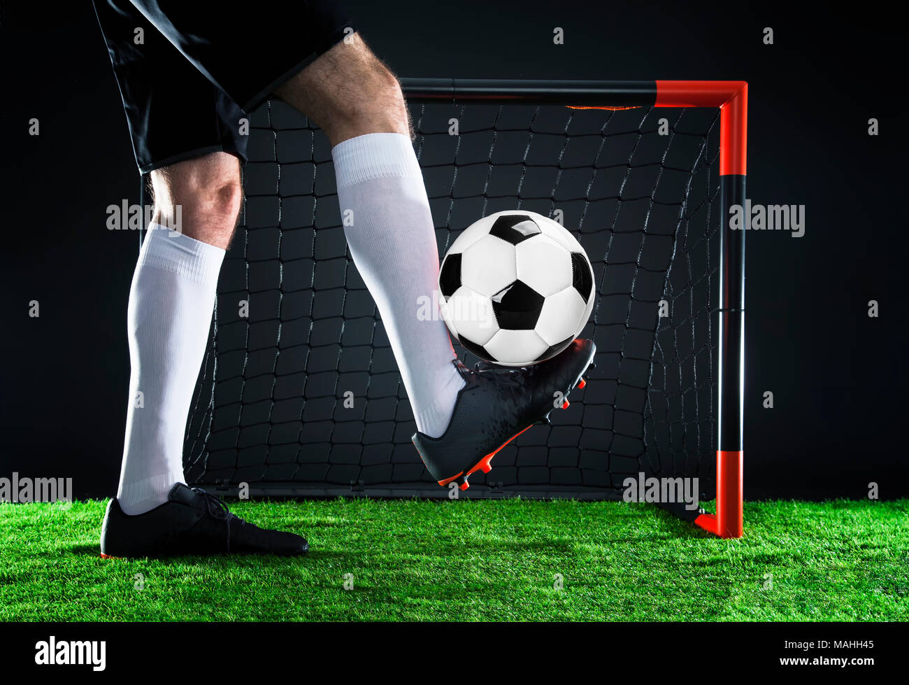 Soccer goal moment.Soccer World cup concept. Striker shooting on goal ...