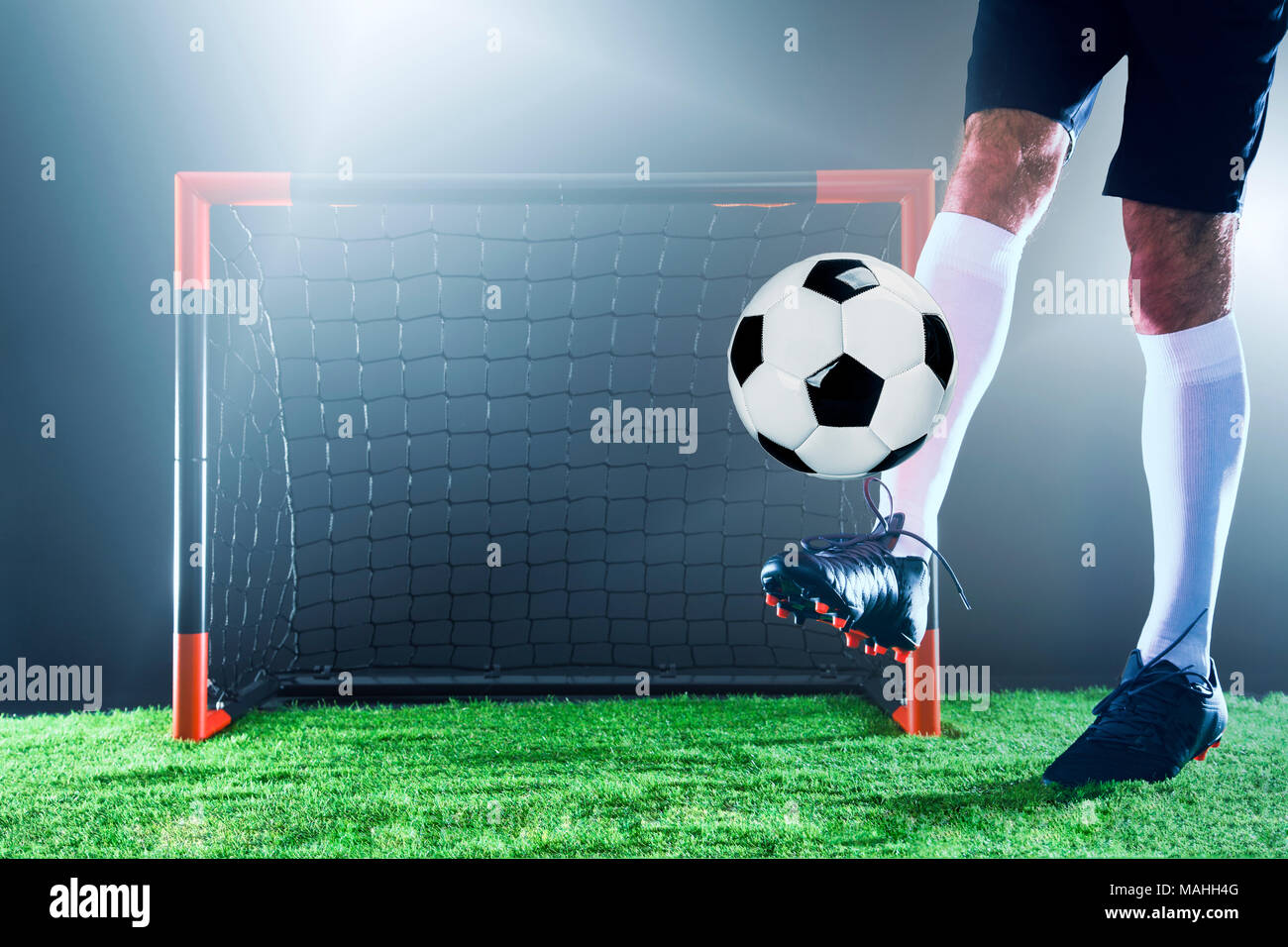 Soccer goal moment.Soccer World cup concept. Striker shooting on goal ...