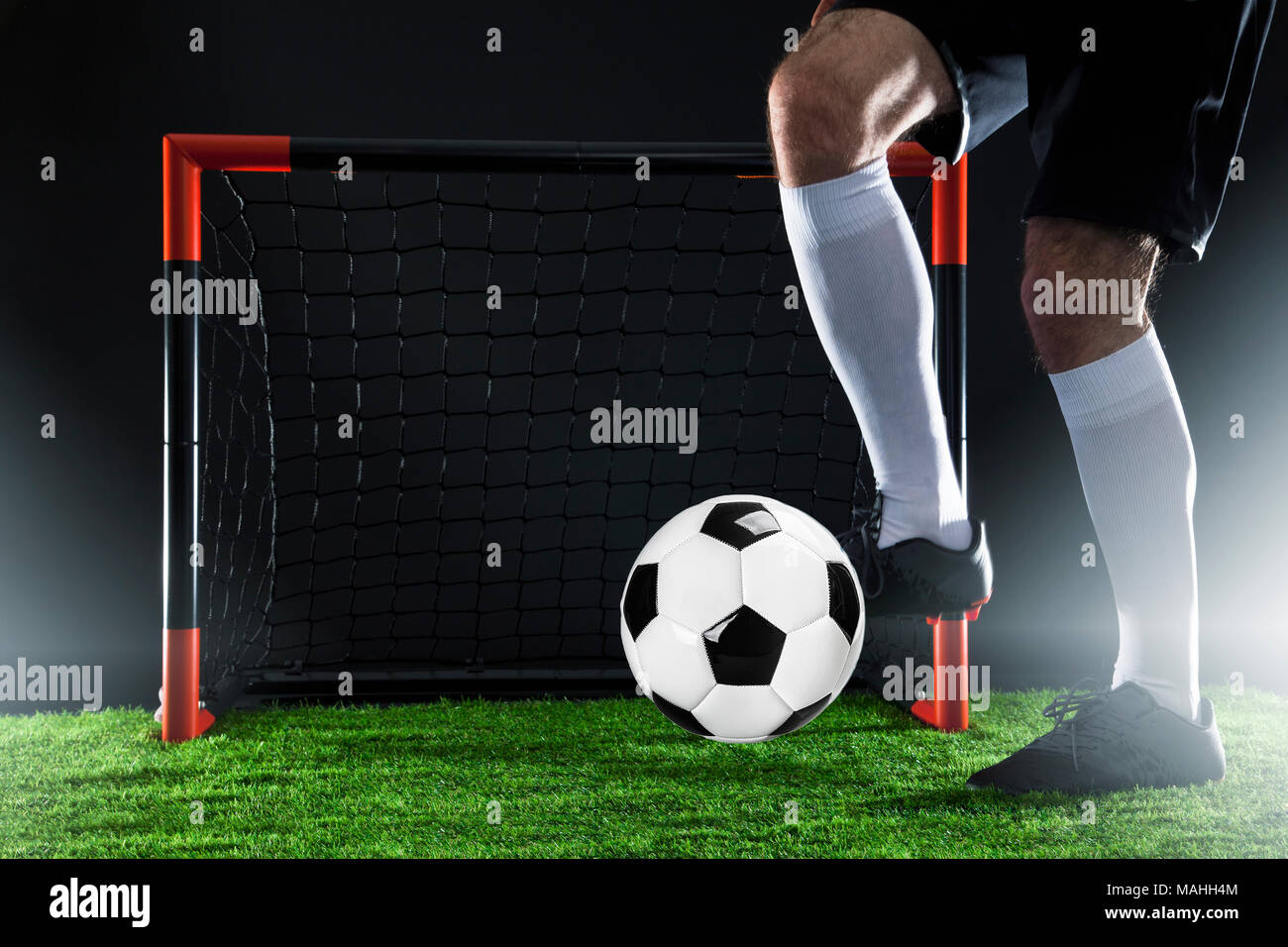 Soccer goal moment.Soccer World cup concept. Striker shooting on goal ...