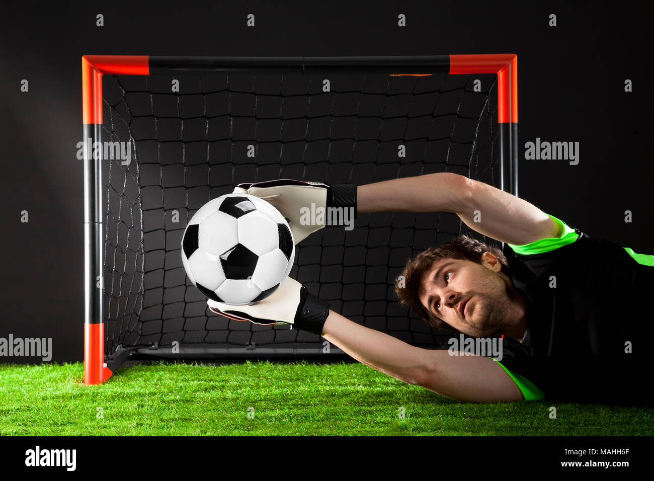 Soccer goal moment.Soccer World cup concept. Striker shooting on goal ...
