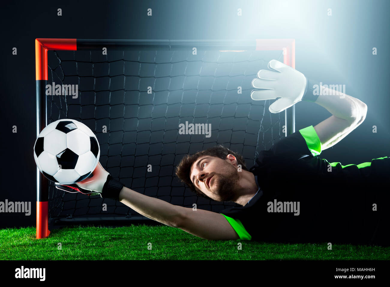 Soccer goal moment.Soccer World cup concept. Striker shooting on goal ...