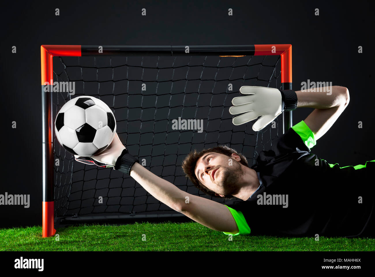 Soccer goal moment.Soccer World cup concept. Striker shooting on goal ...