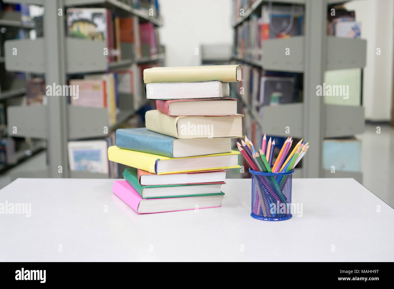 Image of Pile of books and stationery at library. Education concept ...