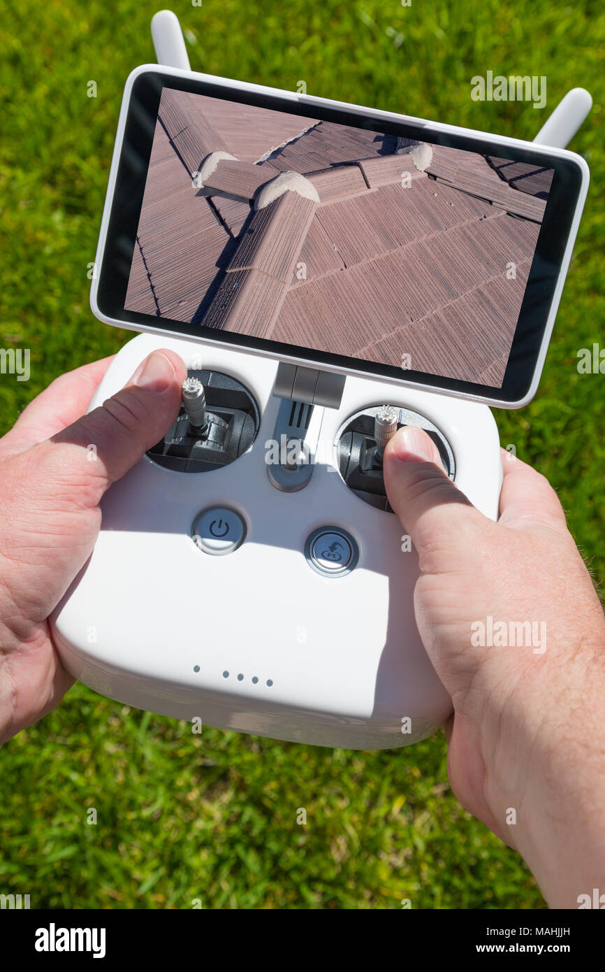 Hands Holding Drone Quadcopter Controller With Residential Roof Image ...