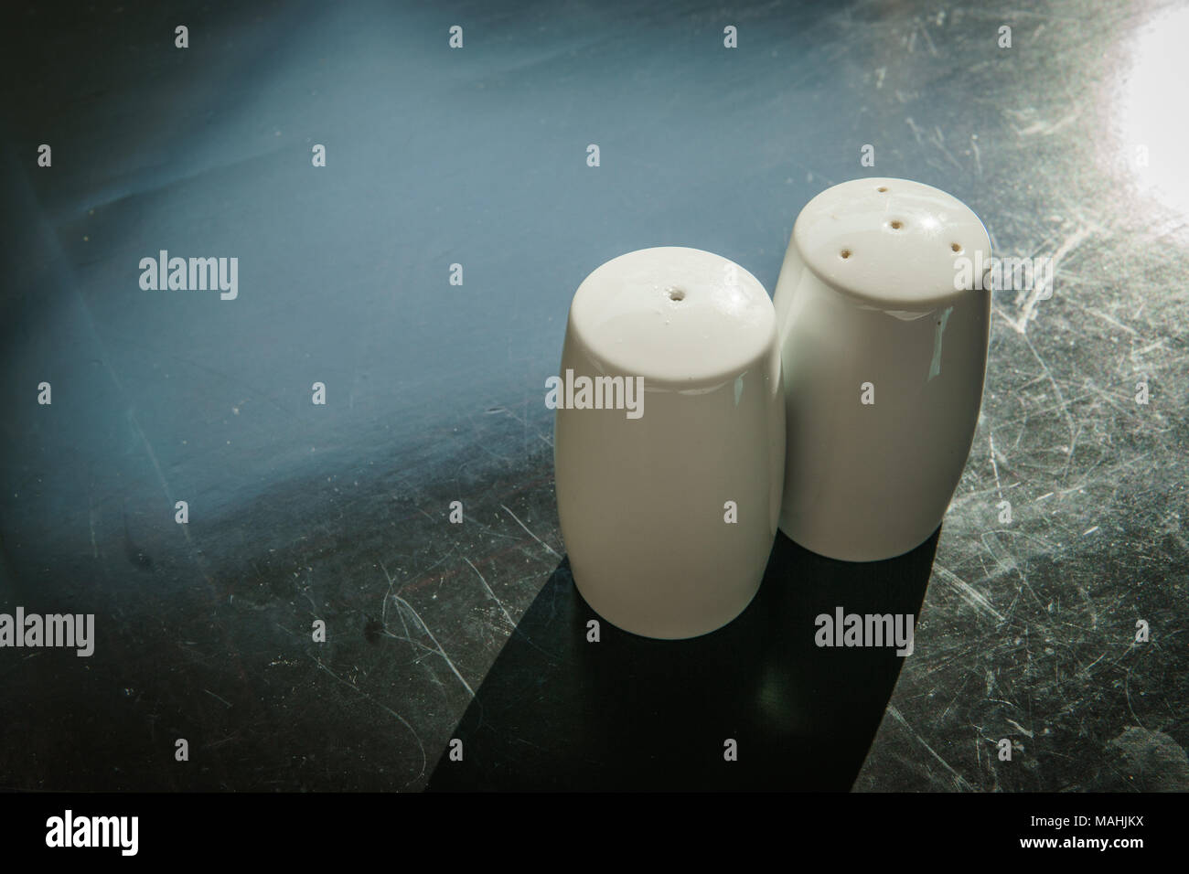 Salt shaker on light hi-res stock photography and images - Alamy