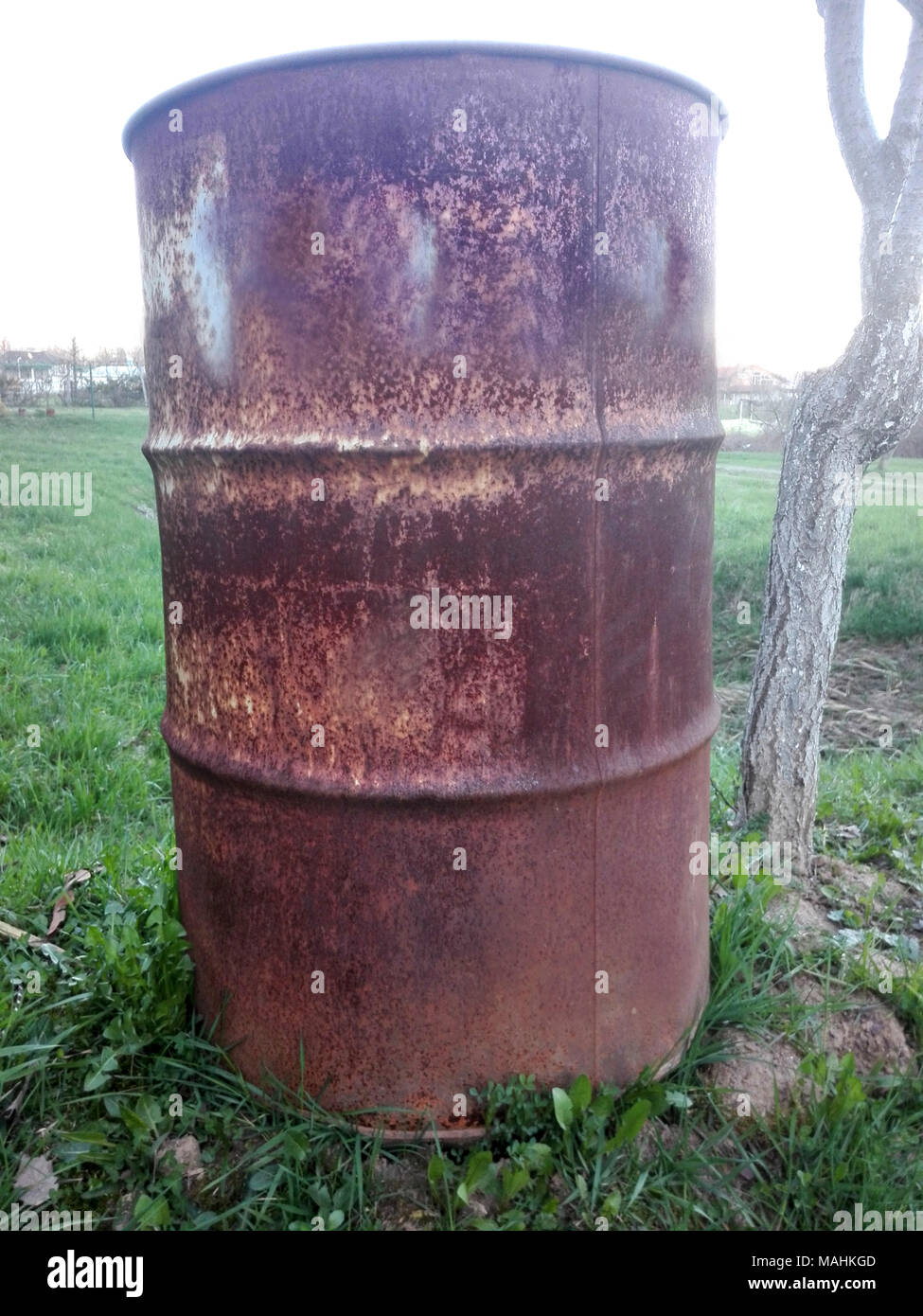 old rusty barrel Stock Photo - Alamy